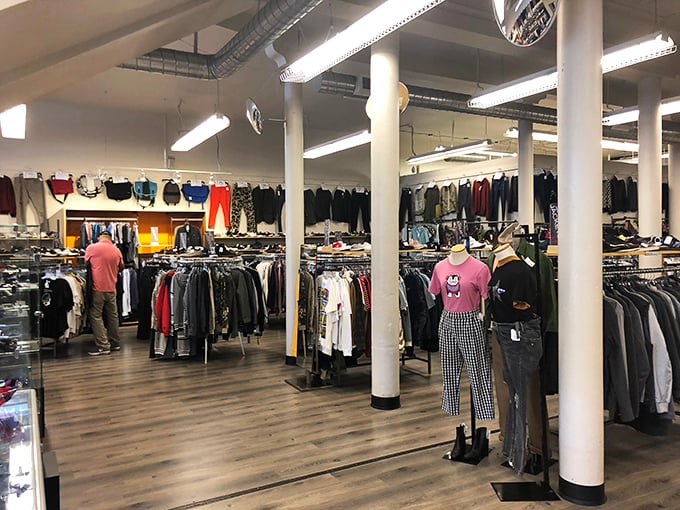 Inside, organized racks create a secondhand symphony - every piece carefully chosen for maximum fashion impact. 