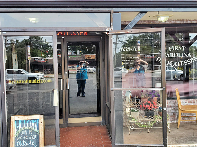 The unassuming entrance to First Carolina Delicatessen is like a secret doorway to sandwich nirvana—just follow the neon "OPEN" sign.