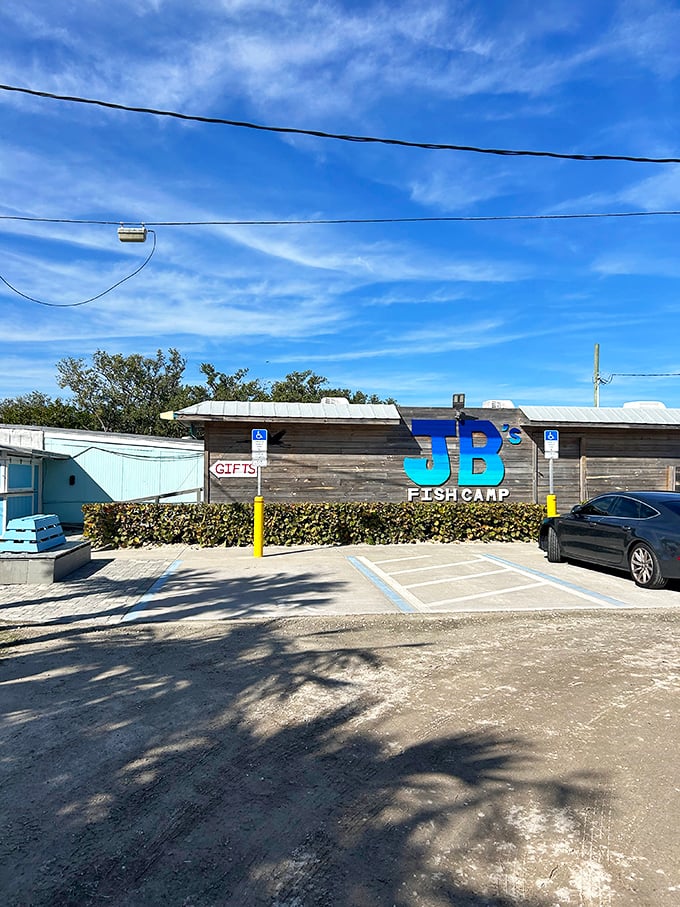 Where the parking lot meets the boat dock – because the best seafood spots let you arrive by land or sea.