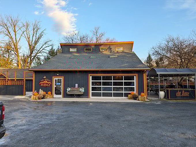 Joe Bosco's BBQ sign stands proudly among the trees, like a beacon of hope for hungry travelers.