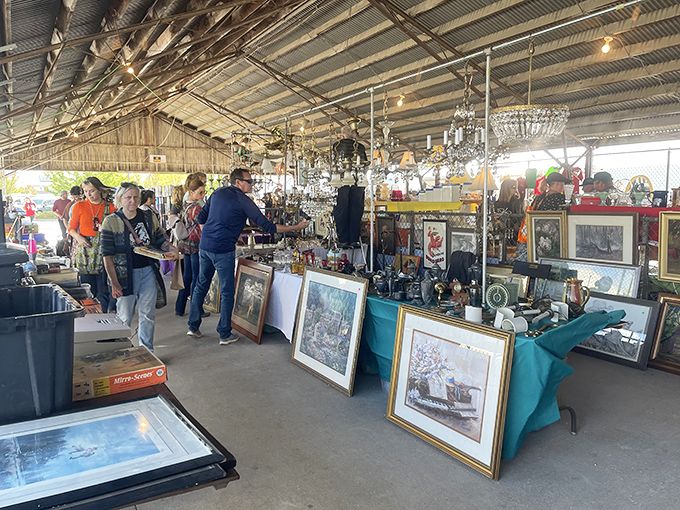 Chandeliers hanging above vintage frames—where else can you furnish a palace on a pauper's budget with this much style?