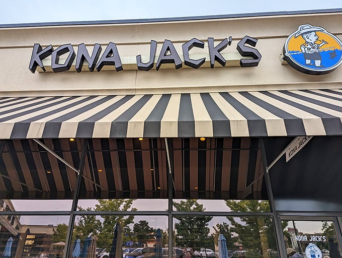 That striped awning hints at the tropical escape waiting inside &ndash; no passport or sunscreen required.