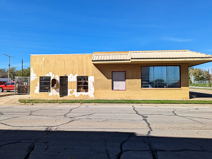 Faded glory with untold stories. This unassuming exterior hides furniture treasures that would make any antique hunter's heart race.