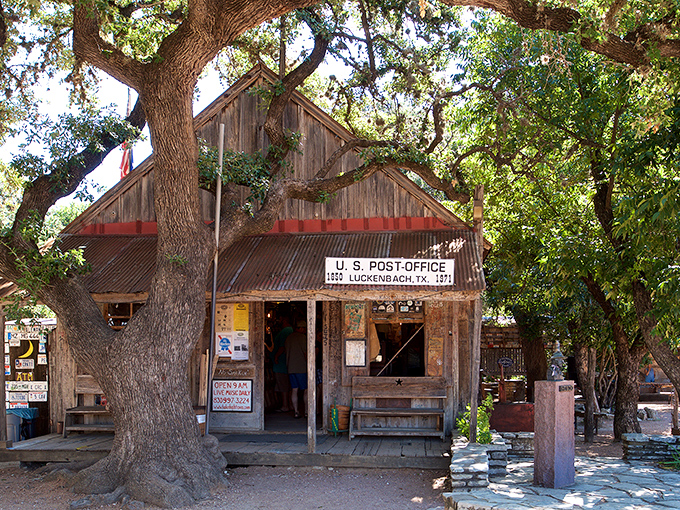 The weathered wood of Luckenbach's post office has witnessed more impromptu jam sessions than most concert halls.