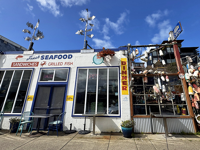 The bright blue-and-white exterior of Ocean Bleu stands out like a cheerful lighthouse on Newport's bustling bayfront.