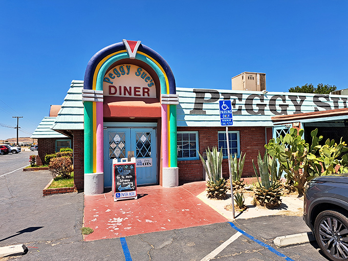 The colorful jukebox-inspired entrance to Peggy Sue's stands like a mirage in the desert&mdash;except this one actually delivers on its promises.