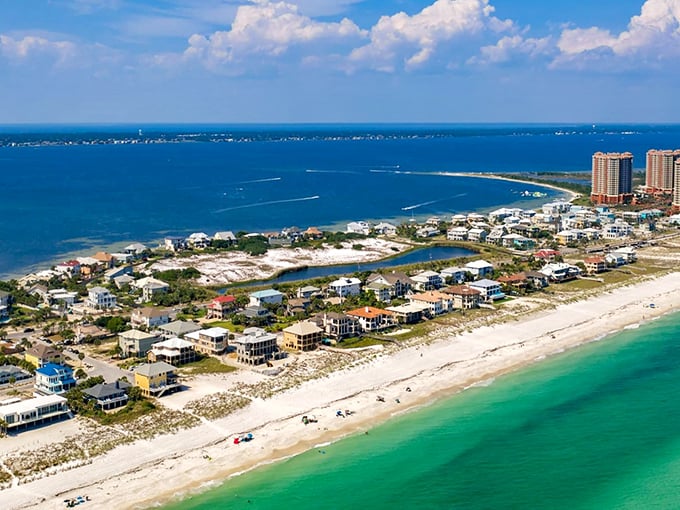 Pensacola's palm-lined walkway invites leisurely strolls where the only deadline is sunset.