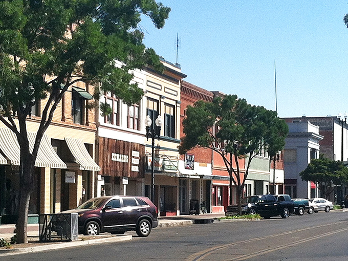 Modern meets historic in Porterville's downtown, where shade trees offer respite from the Central Valley sunshine.