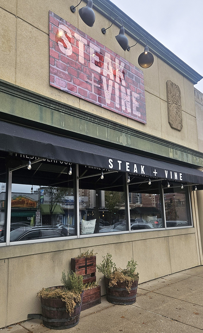 That rustic brick sign promises what lies within &ndash; a temple to perfectly seasoned, expertly seared beef that'll haunt your dreams.