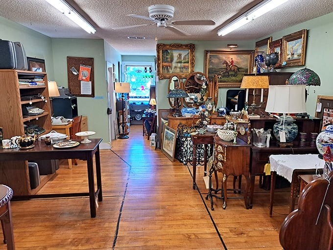 Wide aisles and thoughtful lighting help shoppers navigate through decades of beautiful vintage treasures easily.