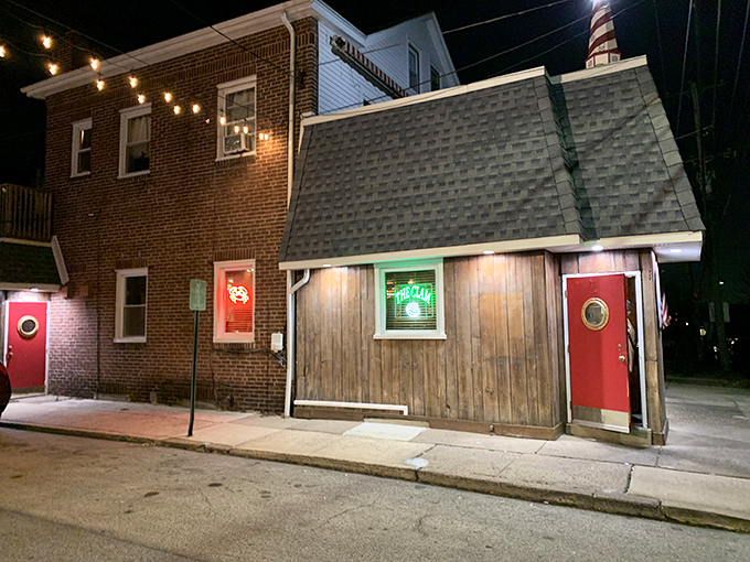 String lights and nautical charm make this seafood sanctuary feel like a secret coastal getaway. The red doors practically wink at passersby.
