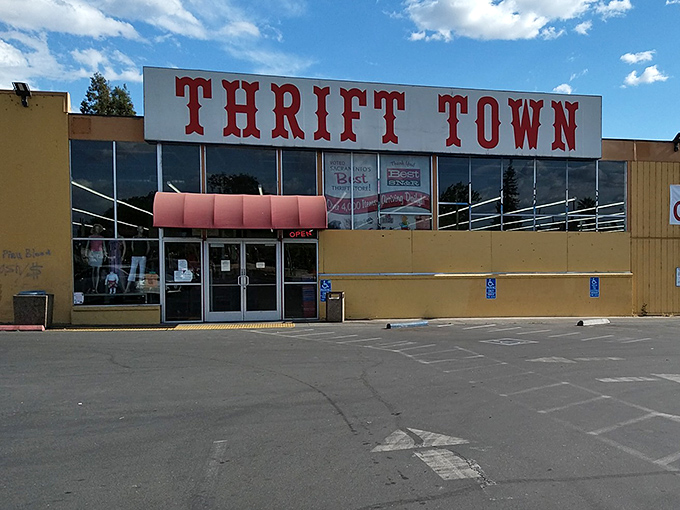 Morning light bathes Thrift Town in possibility. Inside those doors, someone's discards are about to become someone else's discoveries.
