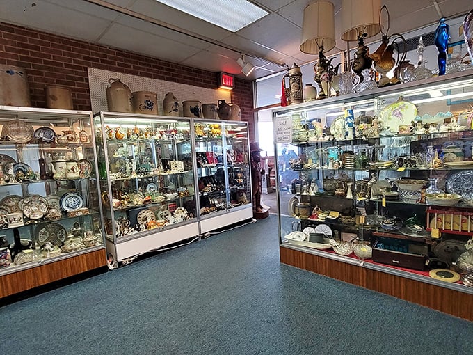 Chandeliers cast a warm glow over Persian rugs and polished wood. Martha Stewart would approve!