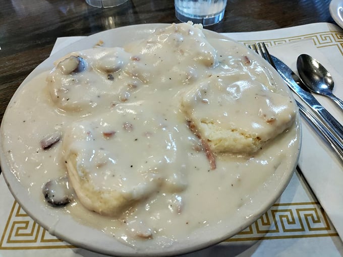 Biscuits and gravy so rich they should have their own tax bracket. This plate doesn't just feed you&mdash;it hugs your soul from the inside.