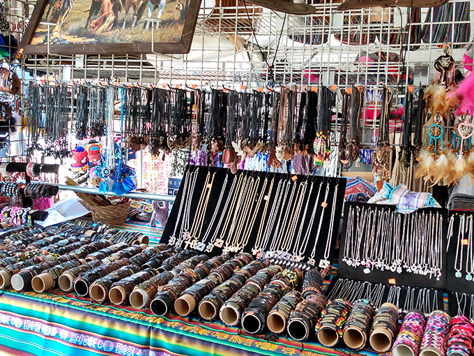 Jewelry and dreamcatchers hang like constellations of craftsmanship, each piece telling a story that might soon become part of yours.