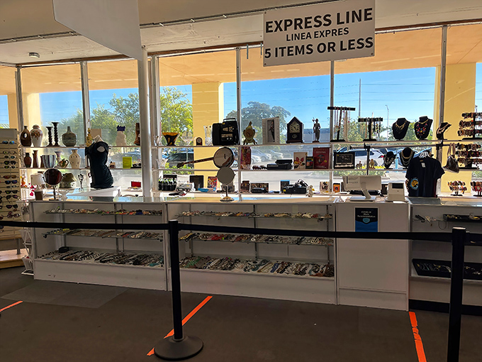 The express checkout counter&mdash;where "five items or less" becomes the ultimate test of willpower for bargain hunters with overflowing carts.