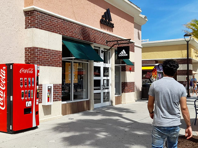 The Adidas store stands ready for athletic aspirations, where weekend warriors and actual athletes alike hunt for performance gear at palatable prices.