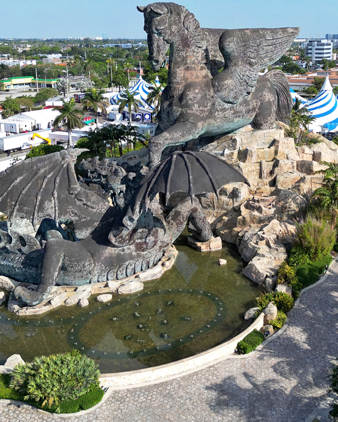 From above, the true scale of this mythological battle becomes clear&mdash;a winged horse and dragon locked in eternal combat above a serene pond.