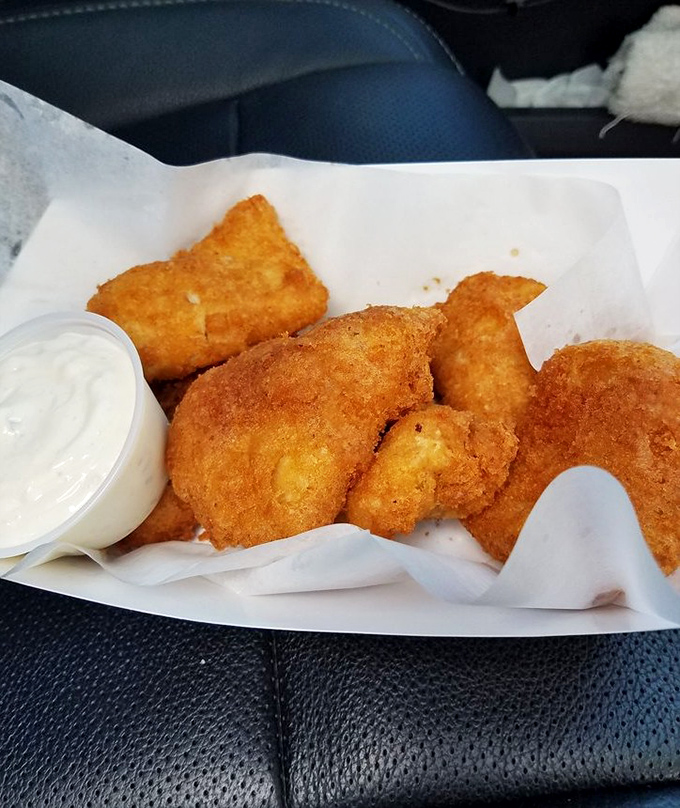 Not all heroes wear capes; some wear beer batter. These generous chunks of albacore tuna have achieved the perfect crisp-to-tender ratio that fish and chips dreams are made of.