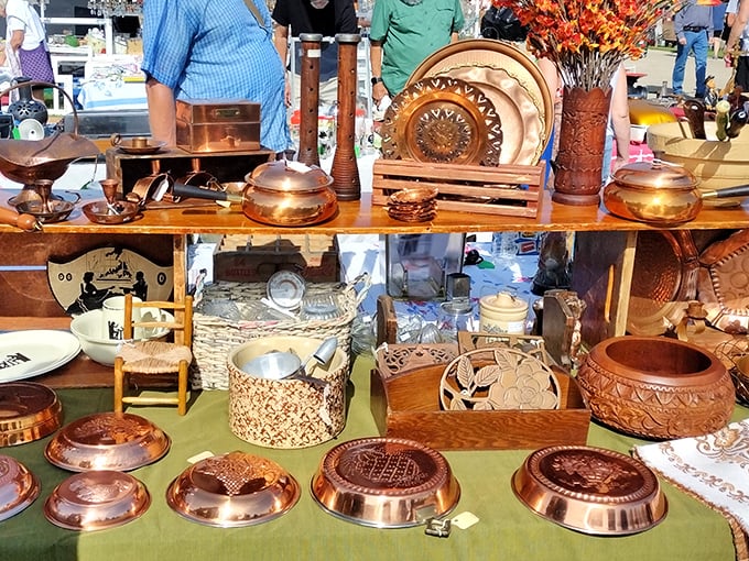 Copper gleams under the summer sun, reflecting both light and nostalgia. These burnished beauties once graced kitchens where recipes were measured by handfuls, not cups.
