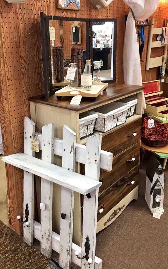 Farmhouse chic meets vintage charm in this cleverly repurposed dresser. That white picket fence headboard? Pure Americana waiting for its forever home.