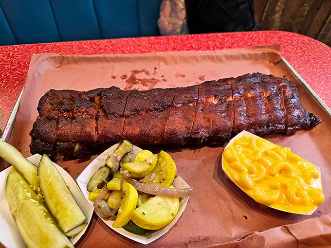 These ribs don't just fall off the bone—they practically leap into your mouth. The smoke ring is practically wearing a halo.
