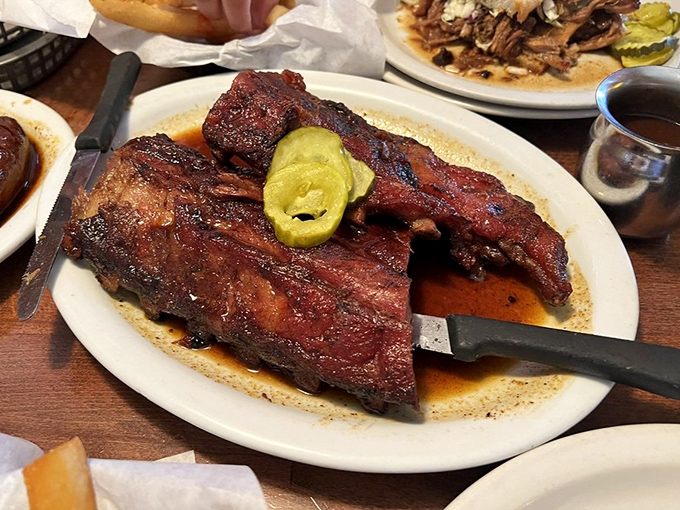 These aren't just ribs; they're edible works of art with a smoke ring that would make a pitmaster weep with joy.