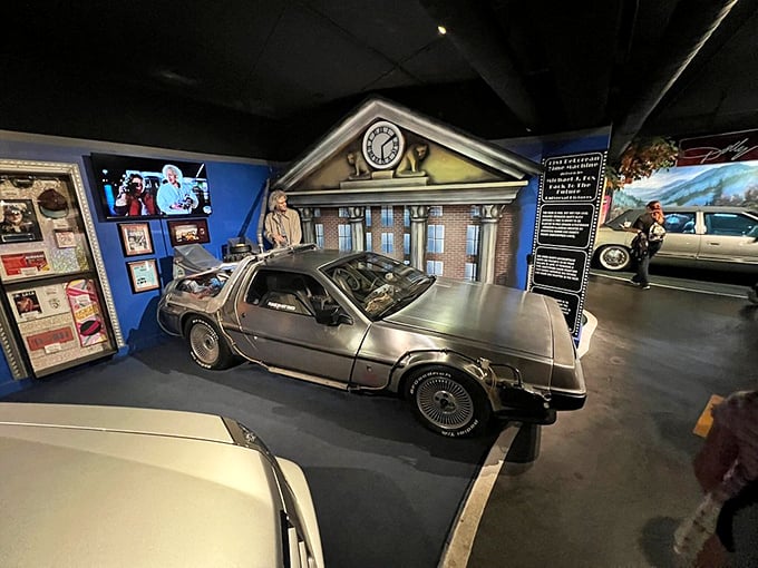 Great Scott! The DeLorean time machine from "Back to the Future" sits poised at 88 mph, flux capacitor intact, ready to transport visitors back to their childhood wonder.