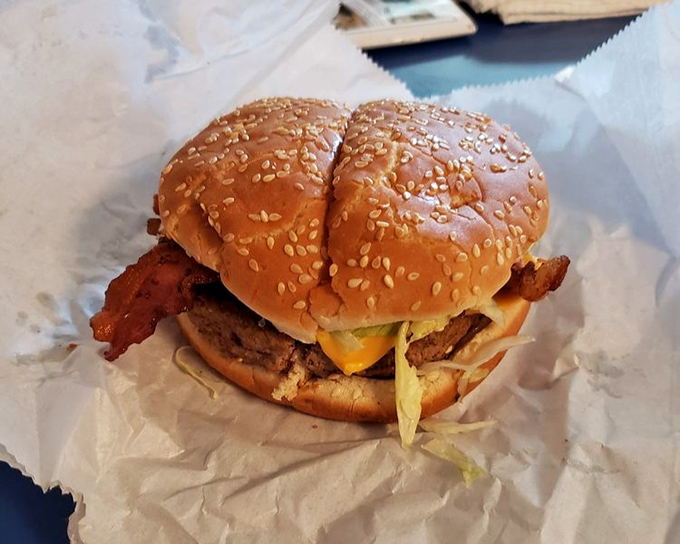 Behold the star of the show&mdash;a bacon cheeseburger that doesn't need filters or fancy plating. Just perfectly melted cheese, crispy bacon, and beef cooked with respect.
