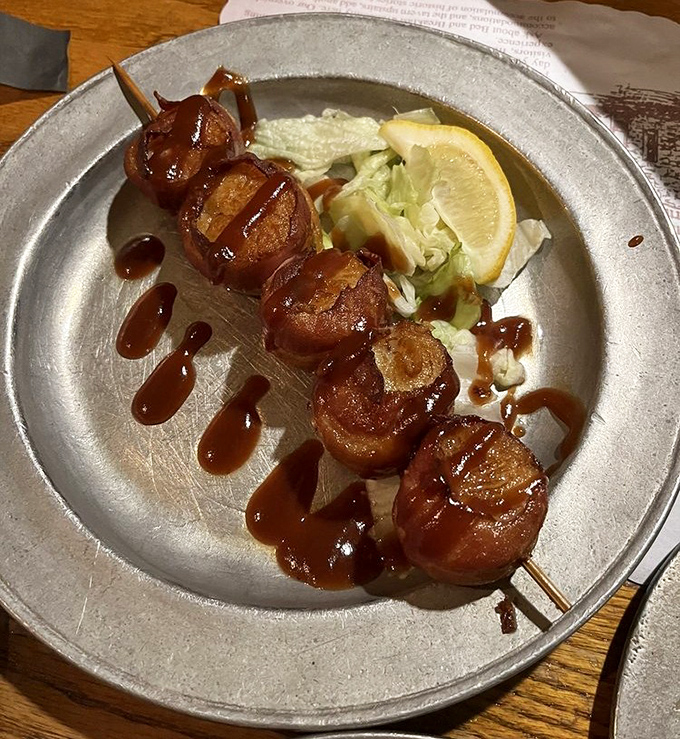 Bacon-wrapped scallops that would make Benjamin Franklin postpone electricity for another day&mdash;glistening with sweet glaze and served with a side of historical significance.