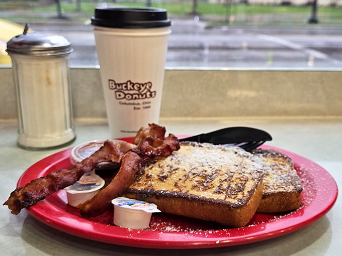 Breakfast of champions! Golden French toast and crispy bacon make mornings worthwhile, even after those nights you can't quite remember.