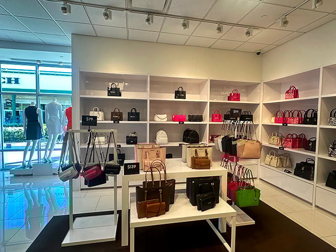 Designer handbags stand at attention like soldiers in formation, each one silently whispering, "Take me home, I'm 60% off and your spouse will never know."
