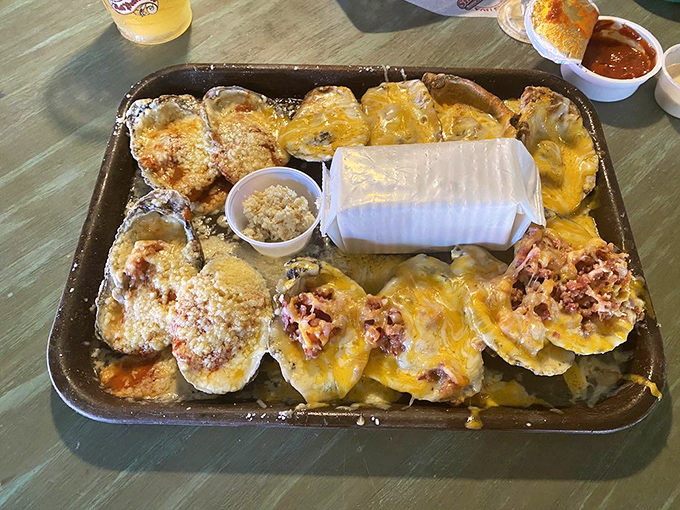 Golden, bubbling cheese blankets these baked oysters like a delicious comforter. One tray could start a family feud over who gets the last one.