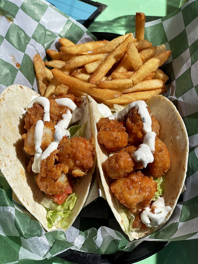 These Bang Bang Shrimp tacos deliver a one-two punch of crispy and creamy. The sauce drizzle is like the final brushstroke on a seafood masterpiece.