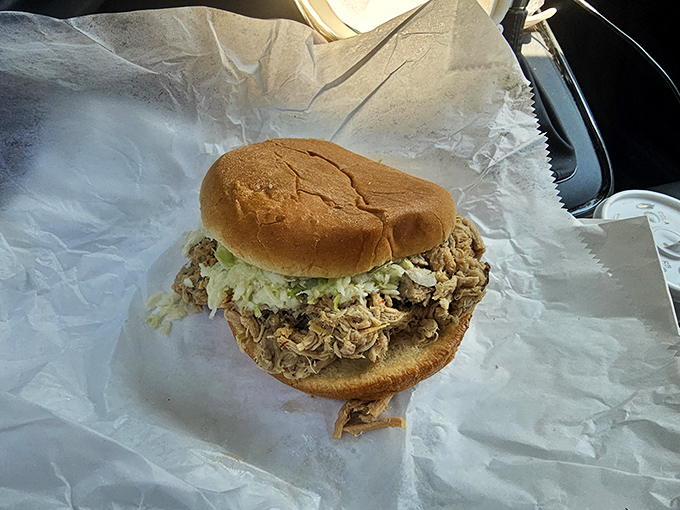 This sandwich doesn't need Instagram filters. The chopped pork with vinegar tang and simple slaw creates a harmony that makes fancy food seem pointless.