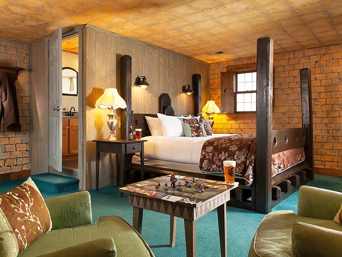 Exposed brick walls and sturdy wooden bed posts create a chamber fit for nobility. The perfect blend of ye olde charm and "thank goodness for modern mattresses."