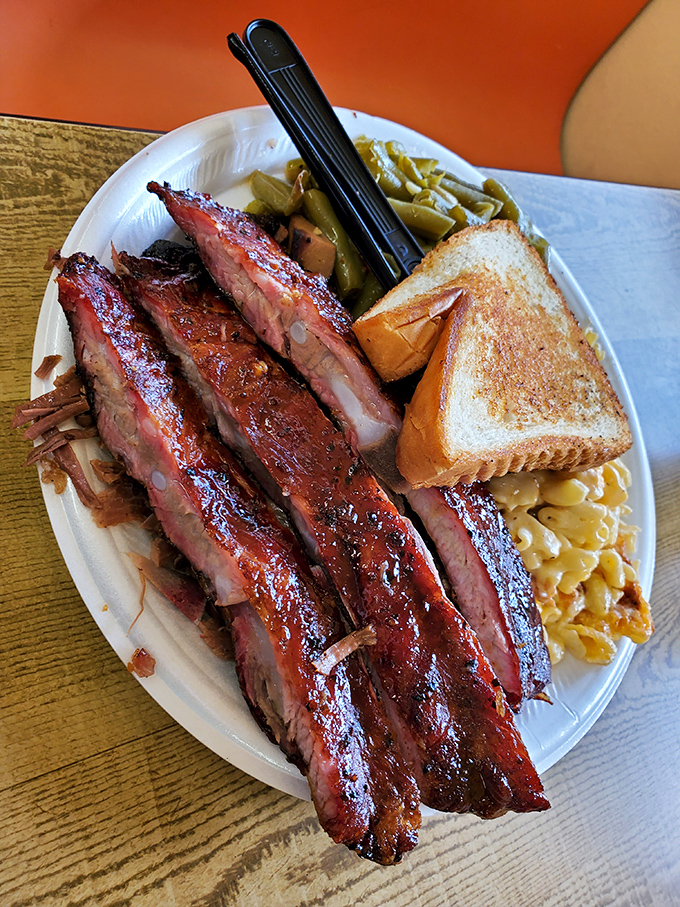 Brisket with that perfect pink smoke ring and sides that refuse to be afterthoughts. This plate is Florida's answer to Texas' bragging rights.