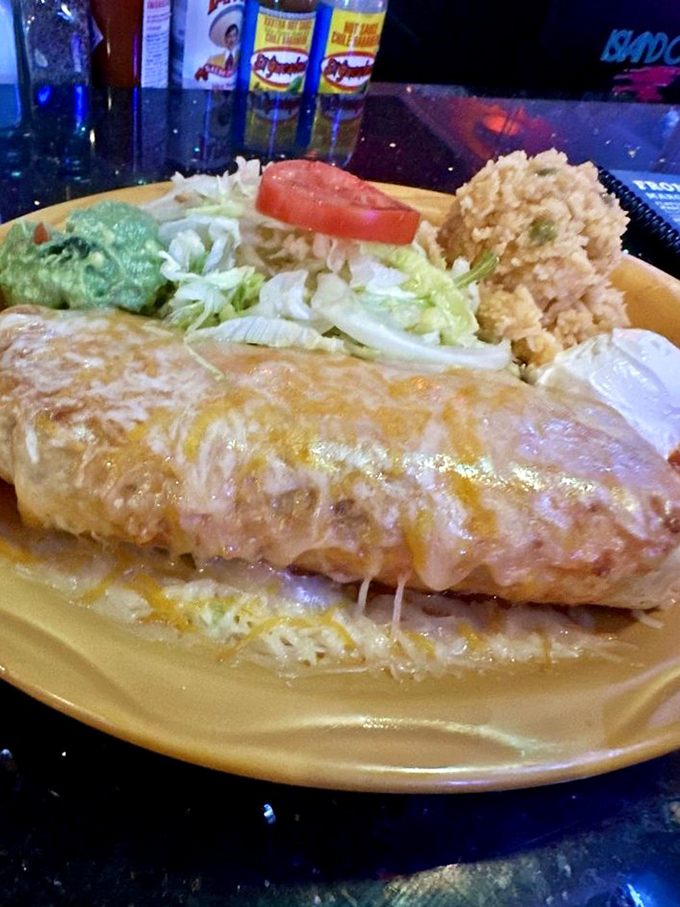 Not all chimichangas are created equal. This golden-fried masterpiece with its melty cheese blanket might just ruin all other chimichangas for you forever.
