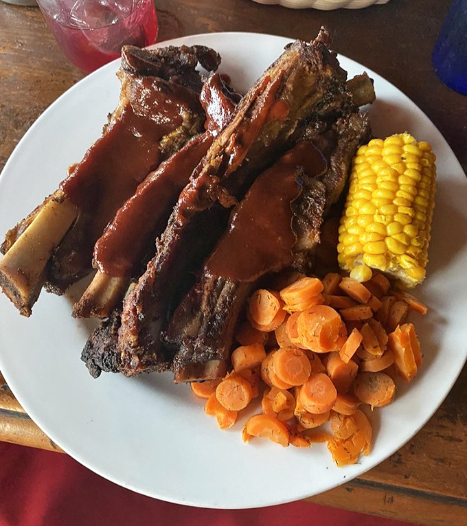 These beef ribs aren't just dinner&mdash;they're prehistoric monuments to carnivorous joy. Fred Flintstone would tip his car over for a rack this magnificent.