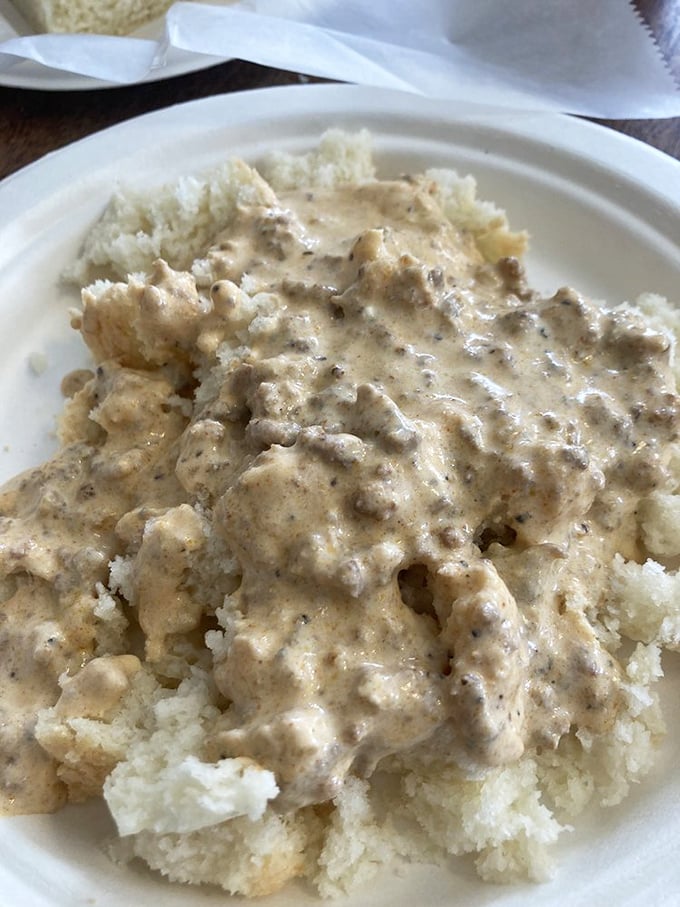 Behold: biscuits and gravy so good they should require a permission slip. Pepper-flecked gravy blankets pillowy biscuits in breakfast bliss.