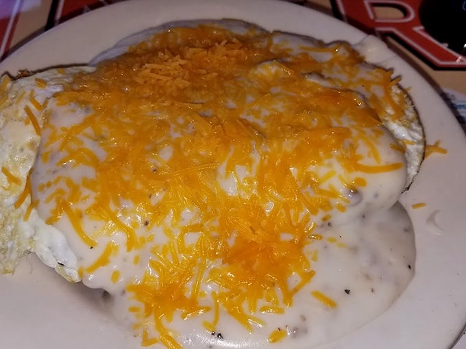Biscuits and gravy topped with melted cheddar&mdash;because sometimes the best things in life need a little extra cheese. Comfort food engineering at its finest.