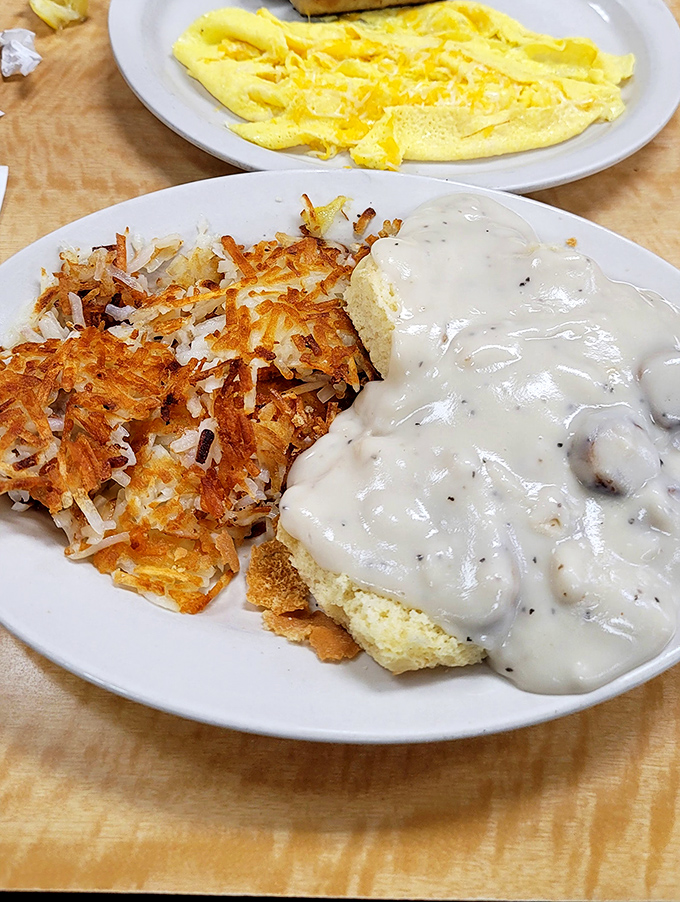 These biscuits and gravy aren't messing around&mdash;golden hashbrowns with that perfect crisp edge and gravy so good you'll want to write home about it.