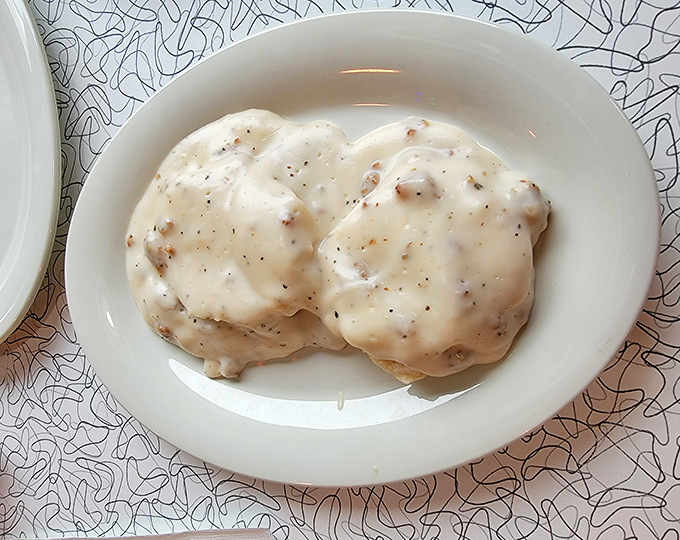 Comfort on a plate! These biscuits swimming in creamy pepper-flecked gravy are what Southern dreams are made of.