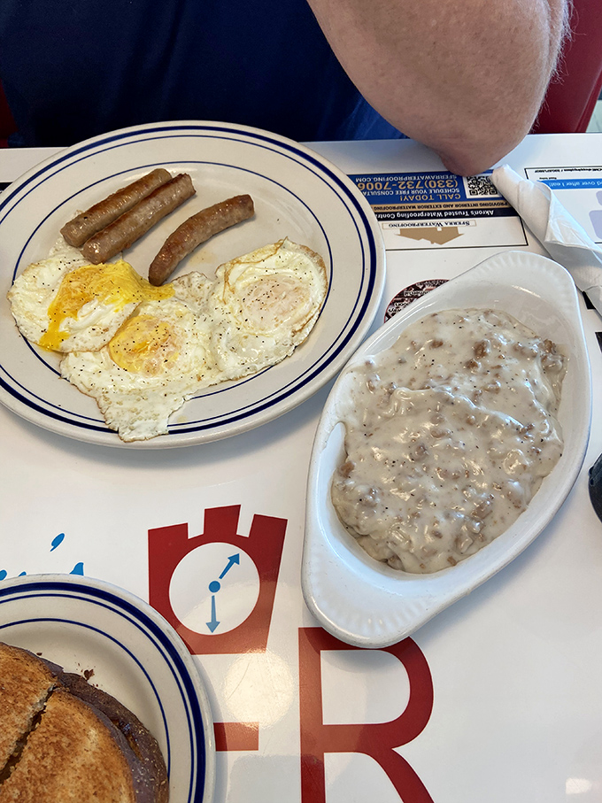 Sunny-side up eggs and sausage links share the spotlight with creamy biscuits and gravy&mdash;a breakfast duet that hits all the right notes.