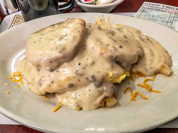 Biscuits and gravy so smothered in creamy goodness they're practically wearing a warm winter coat. This is breakfast architecture at its most glorious.