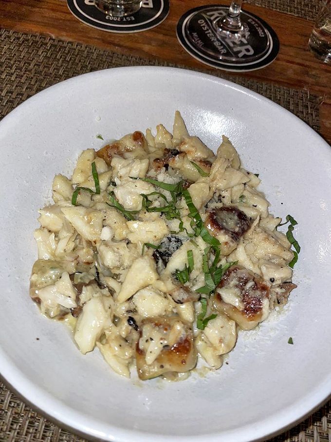 The legendary blue crab gnocchi that launched a thousand road trips. Pillowy pasta perfection that makes grown adults contemplate licking the plate.