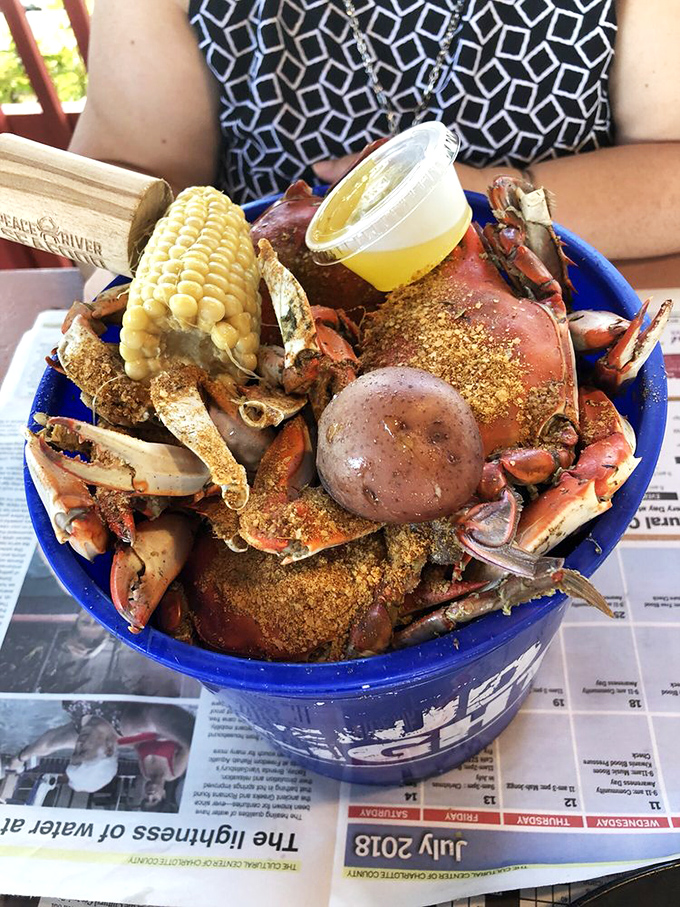 Blue crab heaven arrives in a bucket, not on a silver platter. This spice-dusted mountain of crustacean goodness is Florida's answer to the question: "What's worth getting messy for?"