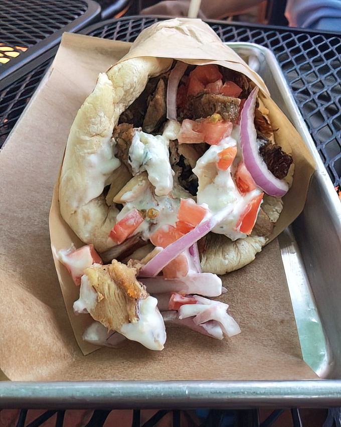 This isn't just a gyro&mdash;it's edible architecture where each ingredient plays its essential role in a symphony of flavor, all wrapped in pillowy pita.