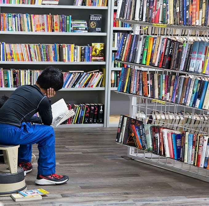 The book section: where literary dreams cost less than a cup of coffee and browsing time stretches like taffy.