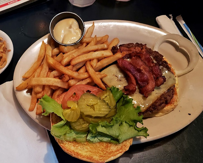 This isn't just a burger&mdash;it's architecture with bacon. The perfect stack of beef, cheese, and crispy goodness that makes diets weep.
